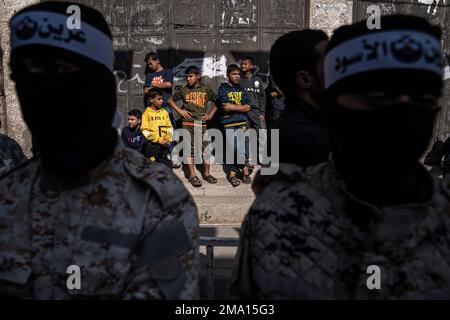 Palestinian children watch Al-Aqsa TV, a station run by Hamas, during a ...