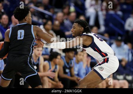 Gonzaga guard Dominick Harris, right, shoots over Northern Arizona ...