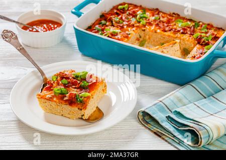 Riced Cauliflower Breakfast Bake topped with melted cheese, green onion ...