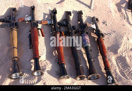 Iraqi RPG-7 portable rocket launchers and an AKM assault rifle are ...