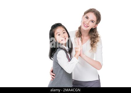 Female teachers and pupils hand-clapping Stock Photo - Alamy