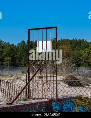 Old firewall with rusty fences on the beach of Prora, Ruegen ...