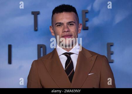 Julian Moore-Cook poses for photographers upon arrival for the ...