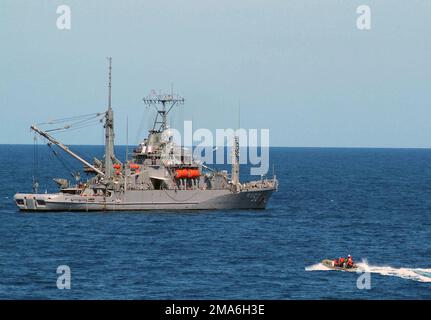 The US Navy (USN) rescue and salvage ship USS SAFEGUARD (ARS 50) makes ...