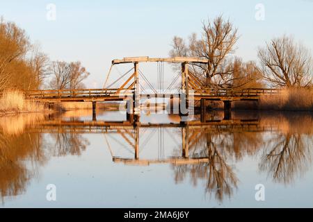 Historic wooden drawbridge over the Trebel near Nehringen, Peene Valley ...