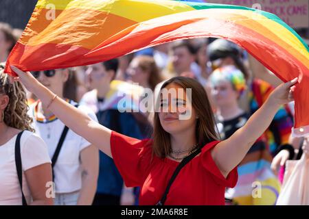 Woman with rainbow flag at the CSD parade, Cologne, North Rhine ...