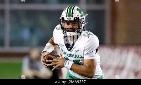 Marshall quarterback Cam Fancher (14) throws a pass as Troy linebacker ...