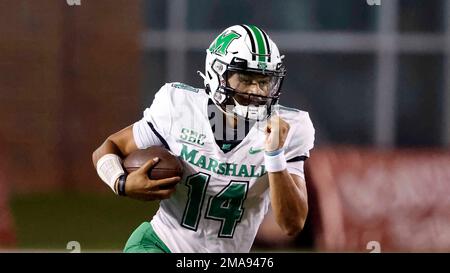 Marshall quarterback Cam Fancher (14) throws a pass as Troy linebacker ...