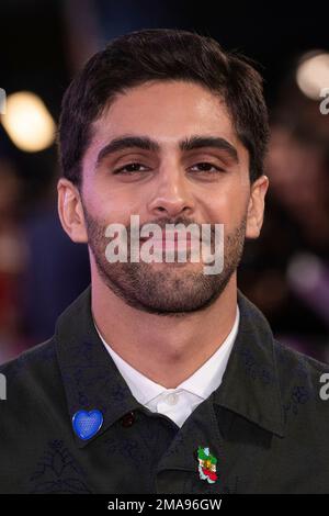 Arian Nik poses for photographers upon arrival for the premiere of the ...