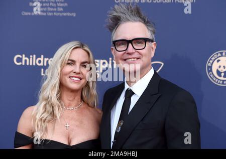 Mark Hoppus, right, and Skye Hoppus arrive at the 2022 Children's ...