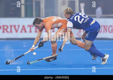BHUBANESWAR - Jorrit Croon (NED) in a duel with Nils Strabucchi (CHI ...