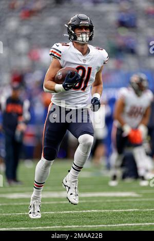 Chicago Bears tight end Jake Tonges (81) warms up before taking on the ...