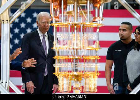President Joe Biden looks at the IBM System One quantum computer during ...