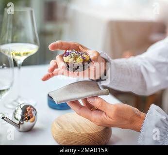 detail of a person tasting a gourmet haute cuisine recipe, based on ...