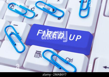 Text sign showing Fired Up. Business idea means that someone energized ...