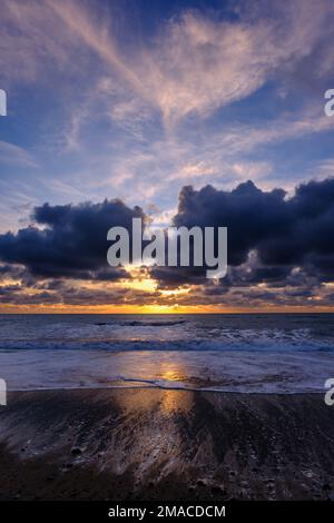 Dramatic coastal sunset at Rhosniegr on Anglesey, North Wales Stock ...