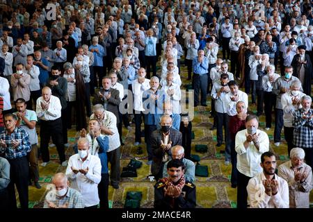 Iranian worshippers perform their Friday prayers at Tehran University ...