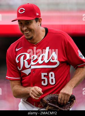 Cincinnati Reds relief pitcher Derek Law (47) throws against the ...