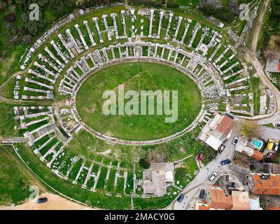 An aerial view of the Roman-era amphitheater carved into the pink ...
