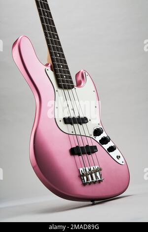 Bass Collection Betsy Guy Pratt bass guitar in pink finish Stock Photo ...