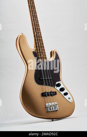 Fender J Bass Vintera in gold finish Stock Photo - Alamy
