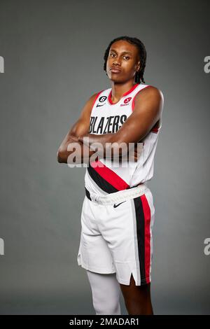 Portland Trail Blazers forward Jabari Walker (34) reacts after falling ...