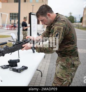 Sgt. Joseph Sanders executes the weapon assembly task immediately after ...