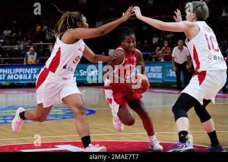 Canada's Shay Colley, runs between Japan's Monica Okoye, left, and Ramu ...