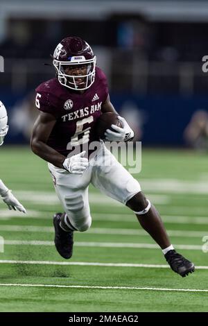 Texas A&M running back Devon Achane runs a drill at the NFL football ...