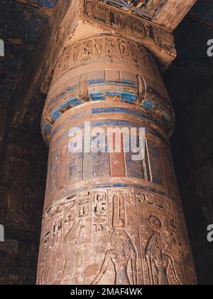 Colourful columns with hieroglyphs in Habu Temple, Luxor, Egypt Stock ...