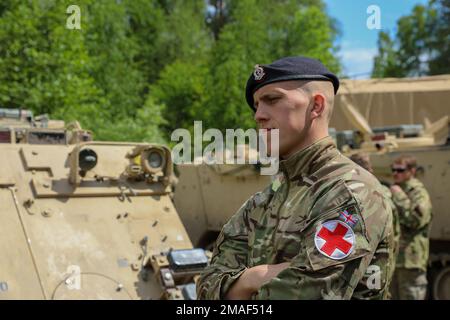 A British soldier assigned to the 1st Armoured Medical Regiment, Royal ...