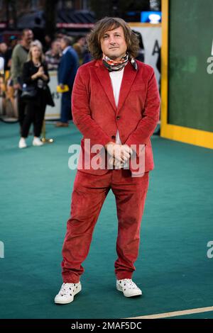 Daniel Pemberton poses for photographers upon arrival for the premiere ...