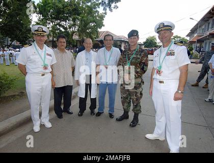 Left, U.S. Navy Capt. Joseph Harder III, commanding officer, Naval ...