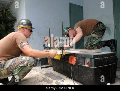 US Navy Members of Naval Mobile Construction Battalion Four (NMCB-4 ...
