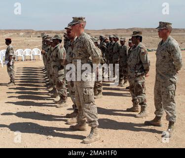 Iraqi soldiers in formation during their graduation ceremony at a ...