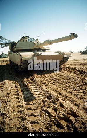An M-1A1 Abrams main battle tank lays a smoke screen during maneuvers ...