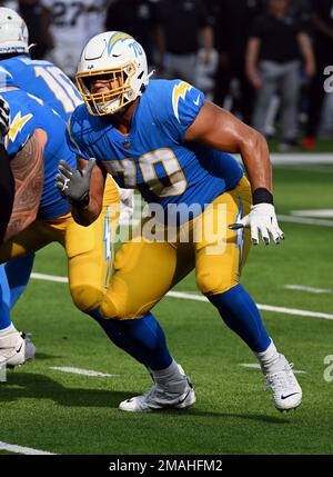 Los Angeles Chargers tackle Rashawn Slater (70) drops into pass ...