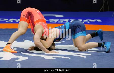 Japan's Masako Furuichi, left, and Amit Elor, of the United States ...