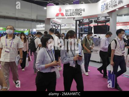 People visit the SEMICON TAIWAN 2022 trade fair at the Nangang ...