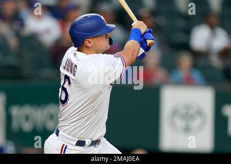 Texas Rangers' Josh Jung follows through with a two-run double off ...