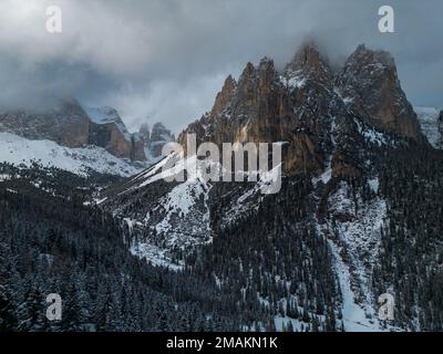A drone shot of Rosengarten Group massif in the Dolomites of northern ...