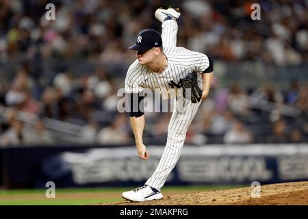 New York Yankees pitcher Clarke Schmidt delivers against the San ...