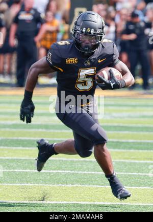 Appalachian State running back Nate Noel, right, carries the football ...