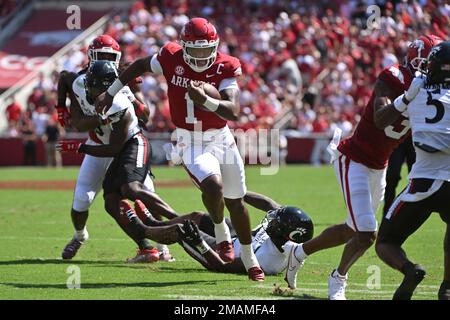 Arkansas quarterback KJ Jefferson (1) breaks through the Missouri ...