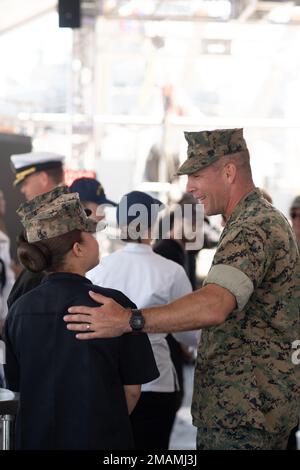 U.S. Marine Corps Col. Sean P. Hoewing, right, commanding officer of ...