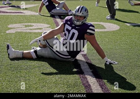 Kansas State offensive lineman Cooper Beebe (50) defends during an NCAA college football game ...