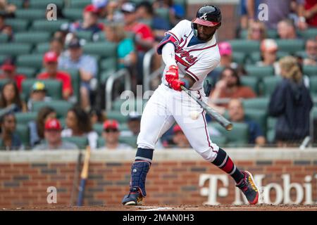 Atlanta Braves' Michael Harris II is hugged by Orlando Arcia in the ...