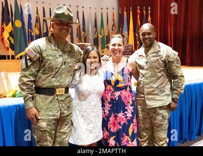 Post Command Sgt. Maj. Philson Tavernier speaks with Sgt. Danielle ...