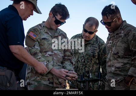 71st Ordnance Group (EOD) Soldiers stand in a receiving line to give thanks and congratulate ...