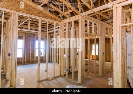 Electrical socket boxes inside frame house with basic electrical wiring ...